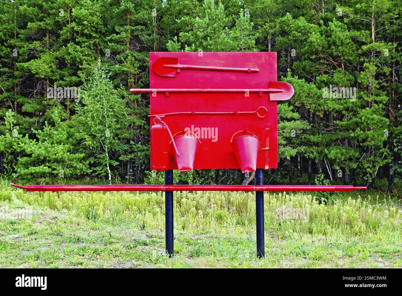 Firefighter shield with buckets, shovels, fire extinguisher and gaff on ...