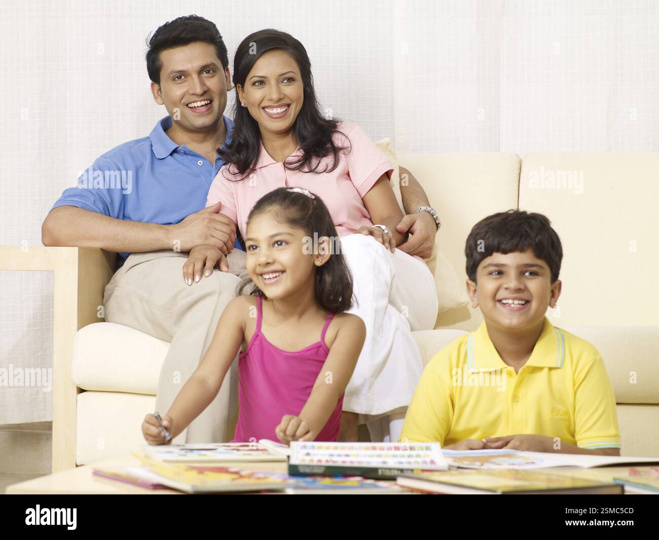 Children doing drawing work parents hi-res stock photography and images ...