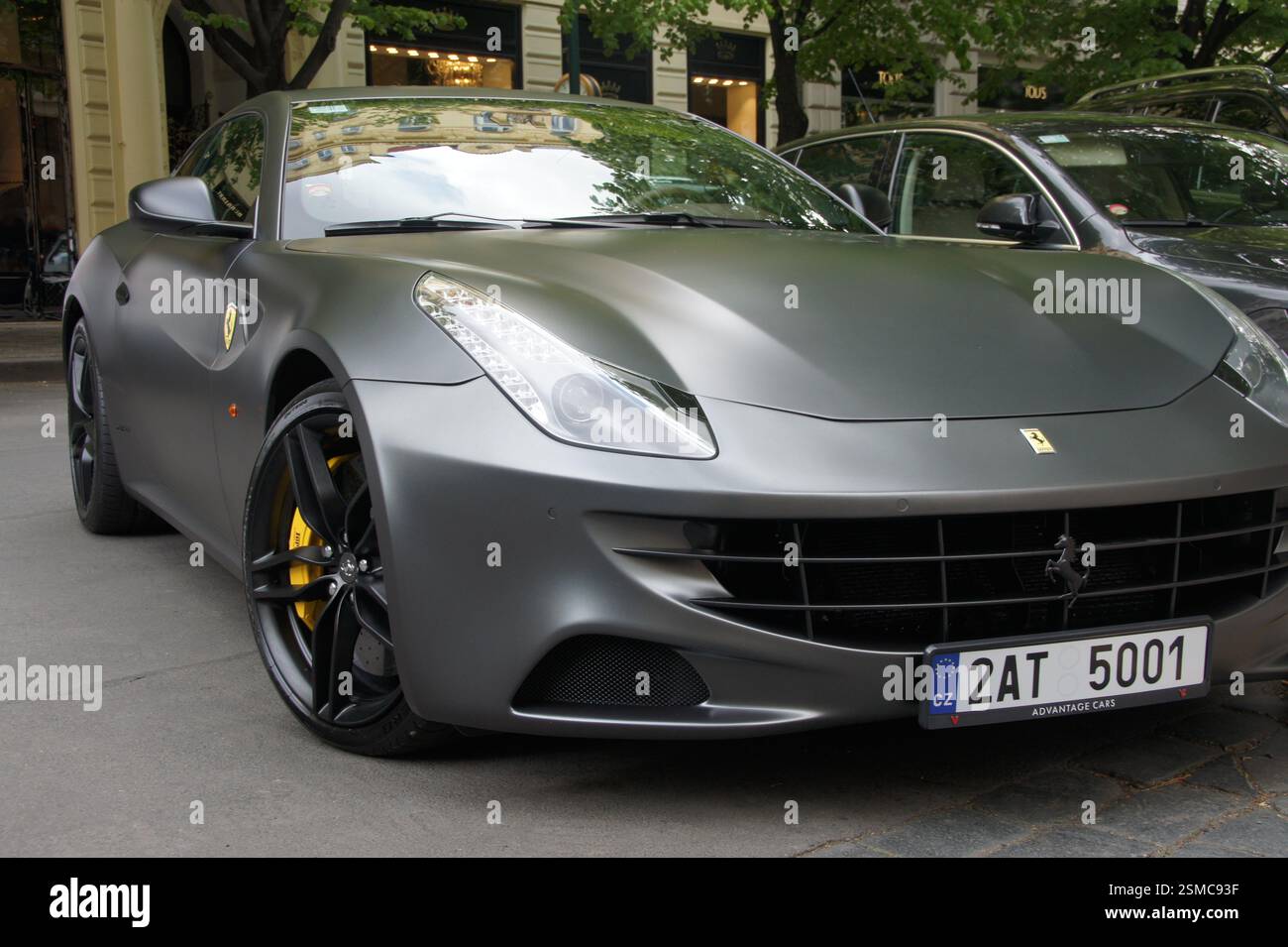Ferrari FF, a luxury sports car, showcases a matte gray finish. It ...