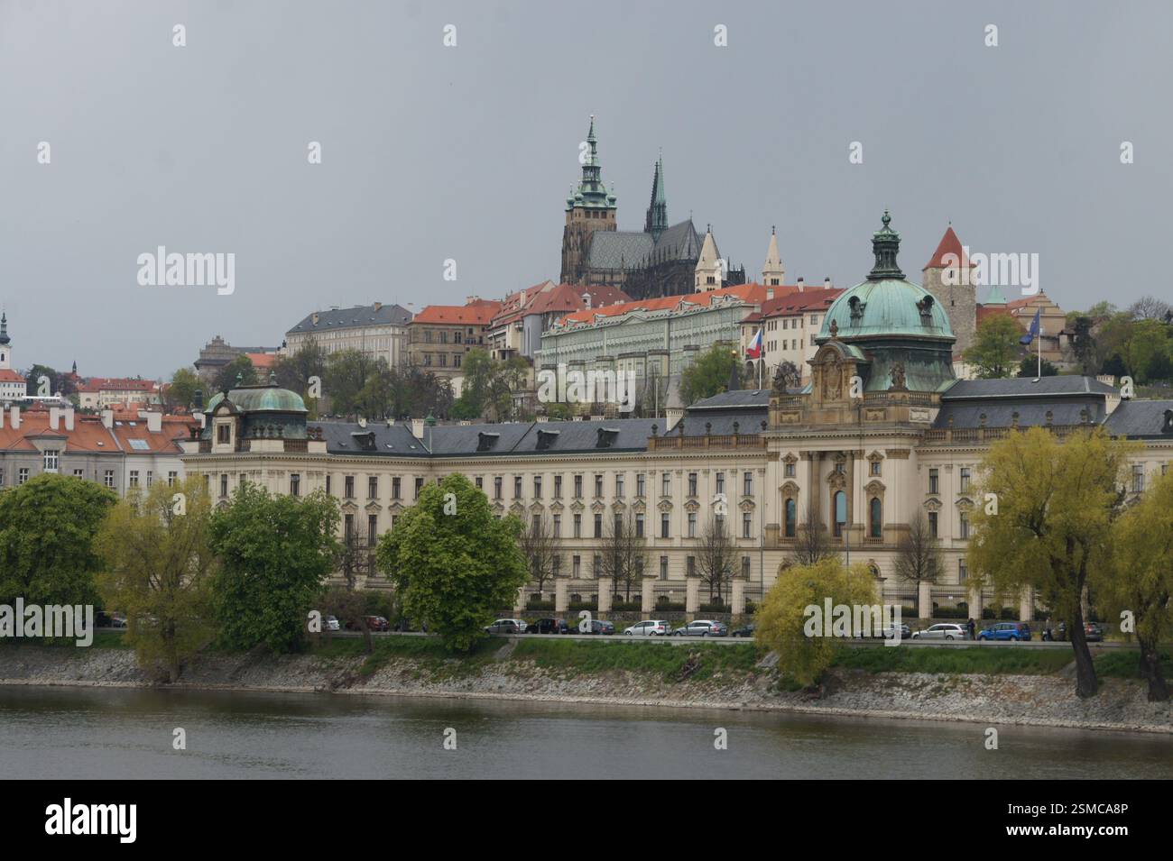 Prague Castle, a sprawling complex of buildings on a hill overlooking ...