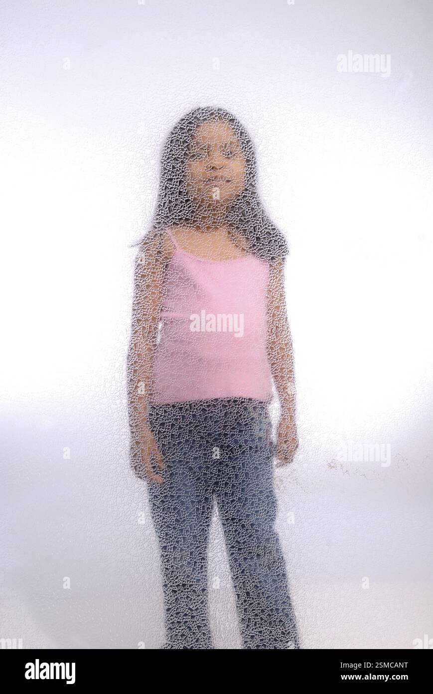 South Asian Indian girl standing behind glass MR#477 Stock Photo - Alamy