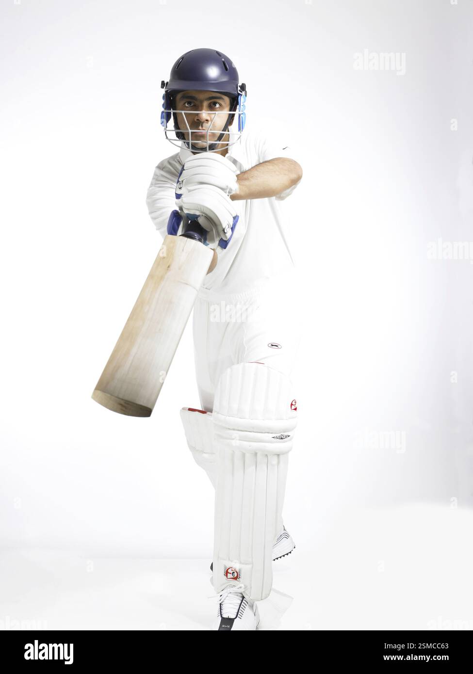 Indian batsman in action of playing shot in cricket match MR#702A Stock ...