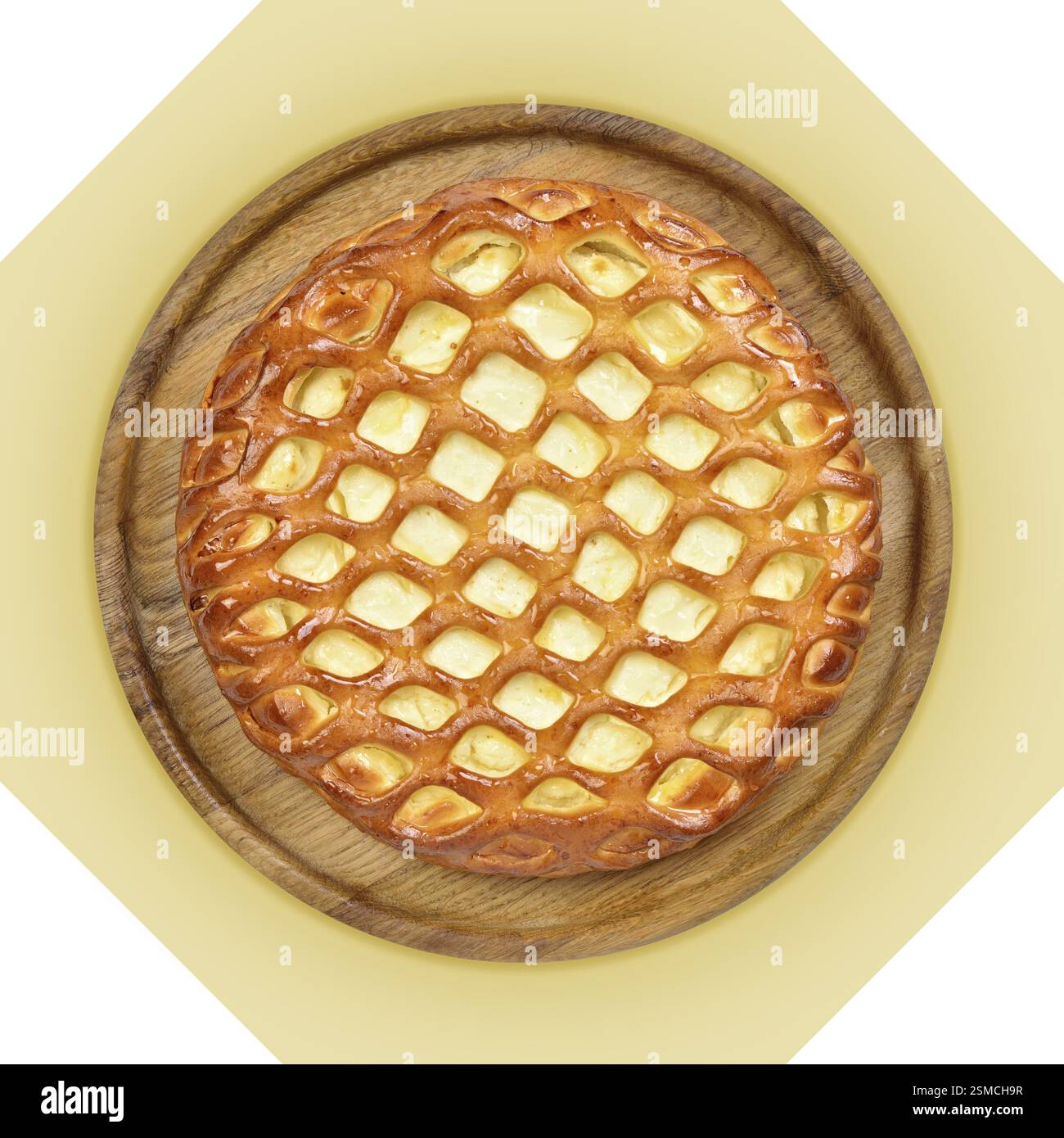 Wooden dish with cheese pie. Isolated image with white background. View ...