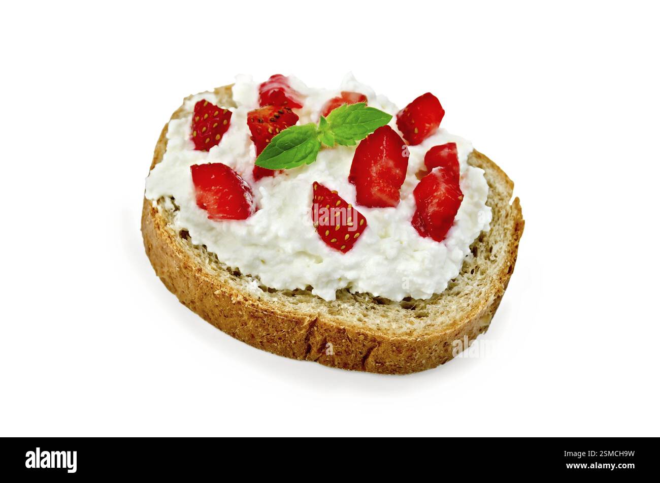 Slice of french bread with curd cream, strawberry and mint isolated on ...