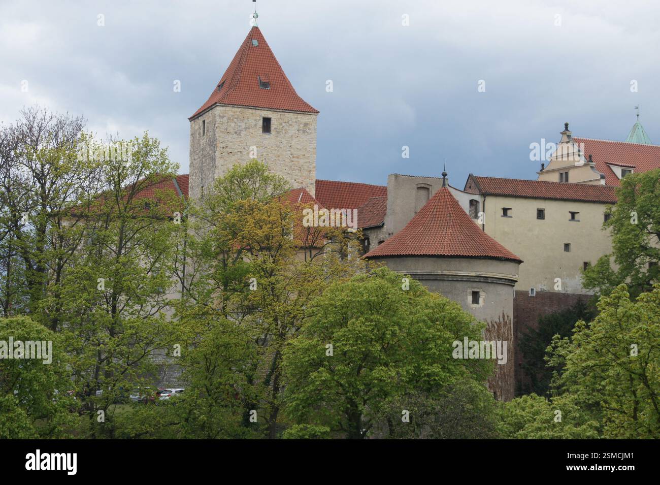 Castle. Medieval architecture with red-tiled roofs and fortified walls ...