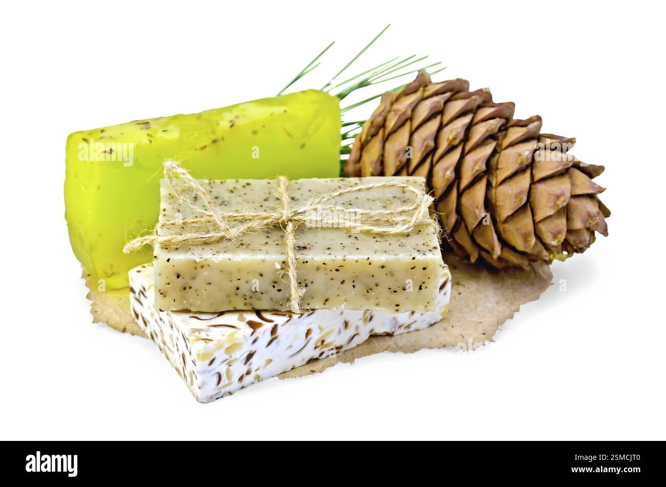 Cedar cone, three homemade soap on paper isolated on white background ...