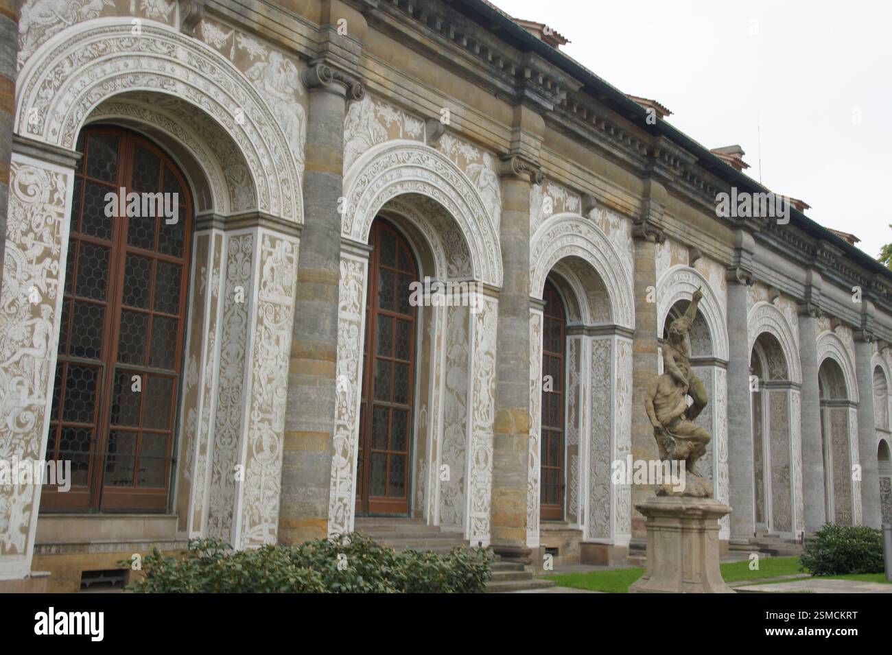 Ball Room of Prague Castle. Arched windows with ornate details and ...