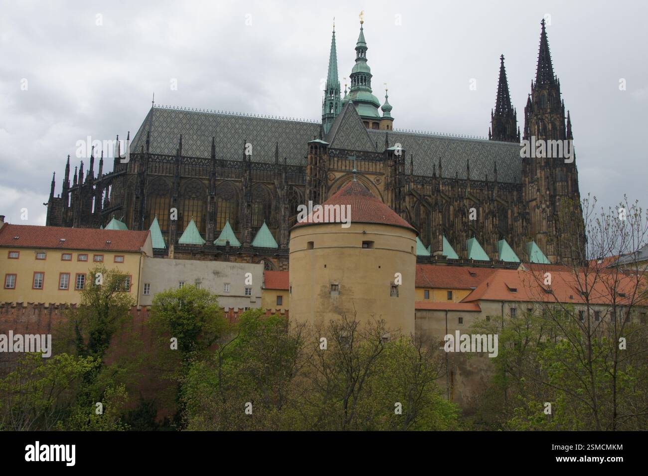Prague Castle, a Gothic masterpiece, overlooks the city. A powder tower ...