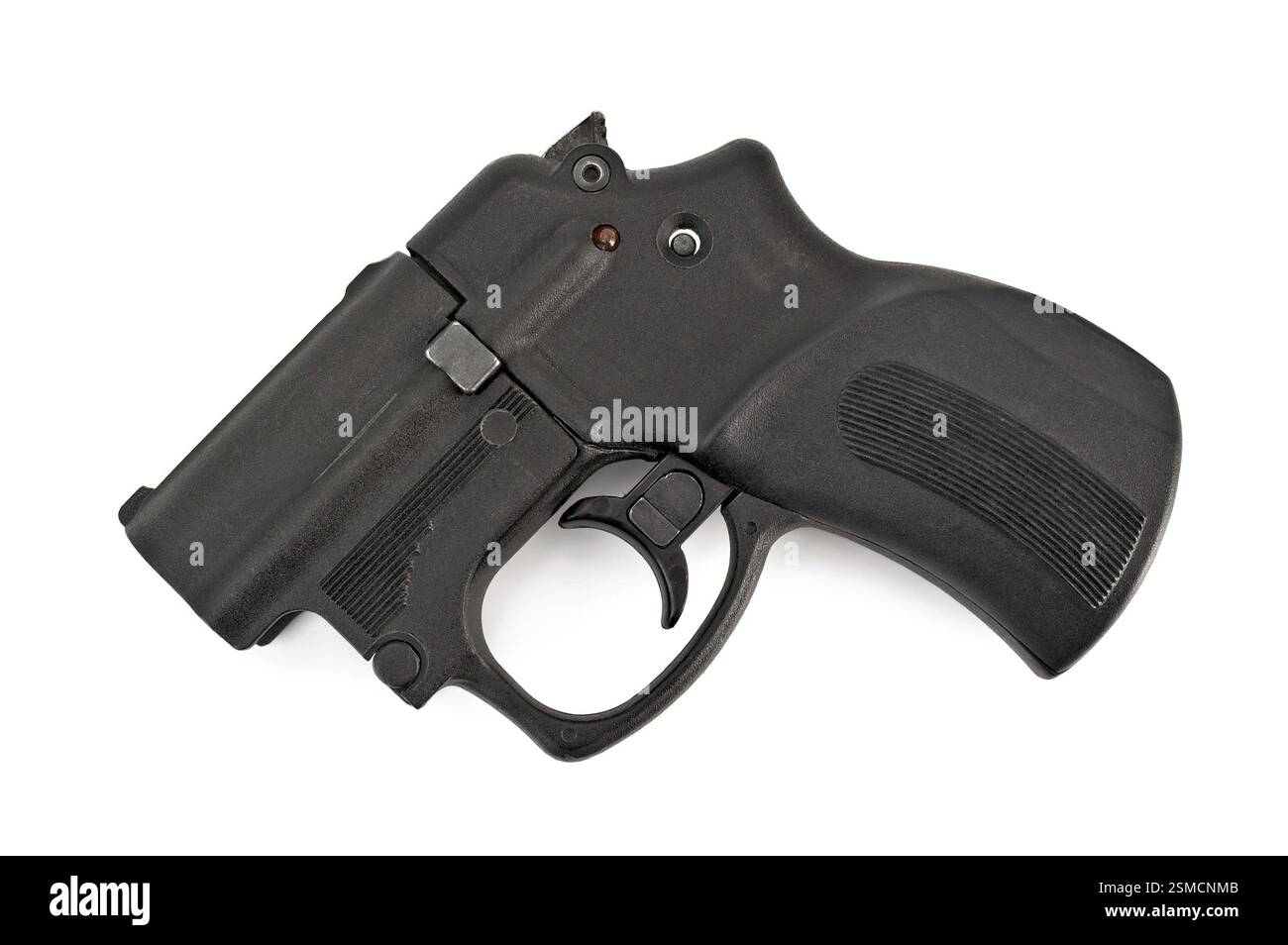 Black traumatic gun isolated on white background Stock Photo - Alamy
