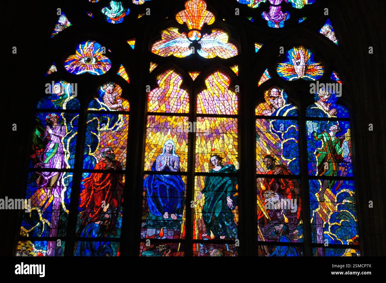 The stained glass window in the Czech Republic depicts religious ...