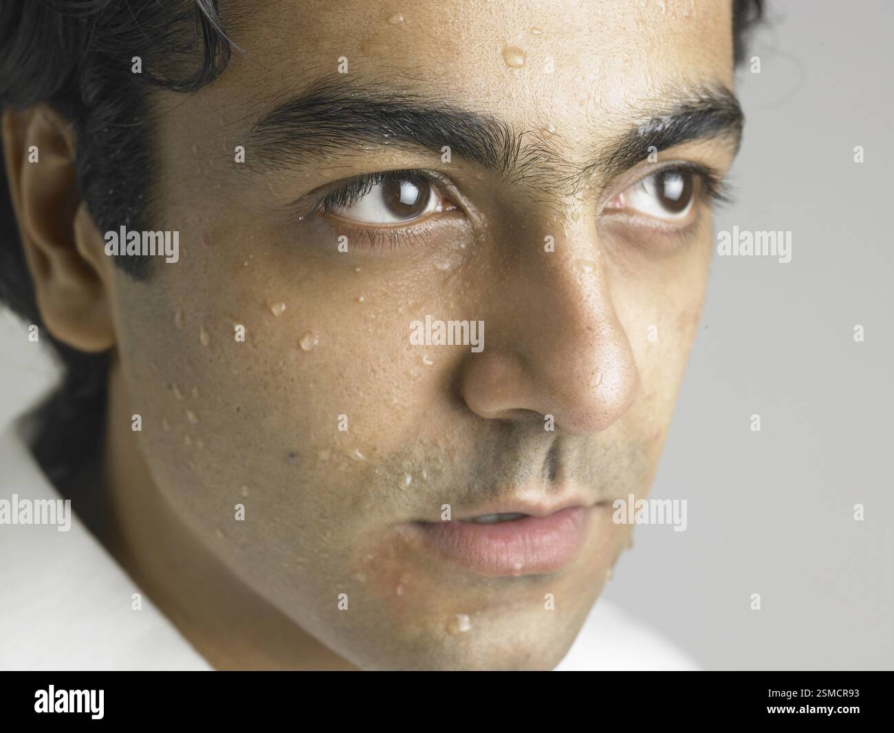 Sweat on face of Indian cricket player MR#702A Stock Photo - Alamy