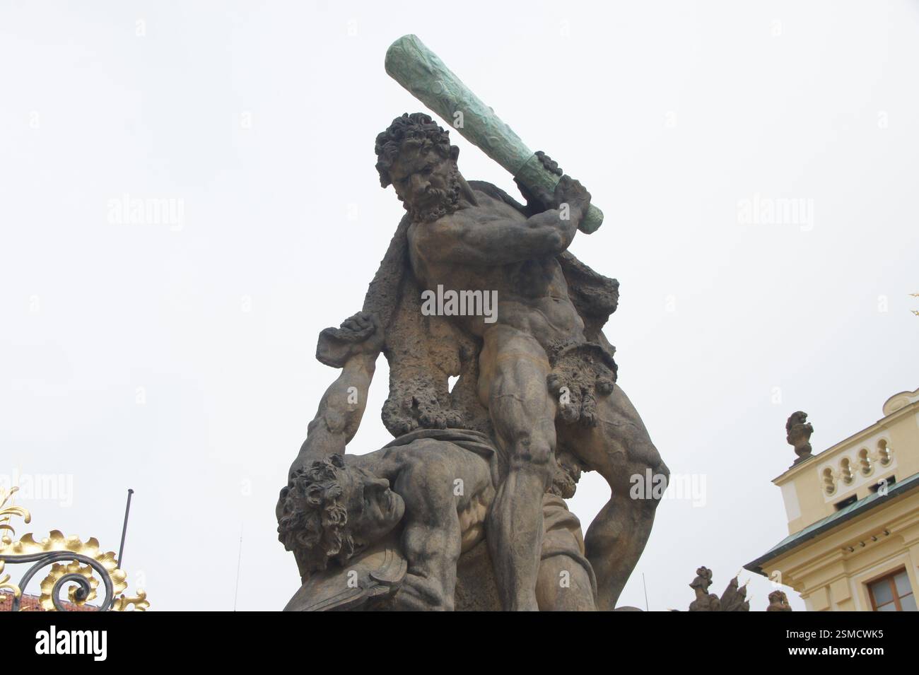 Statue. Man wielding a knife stands triumphantly over a fallen figure ...