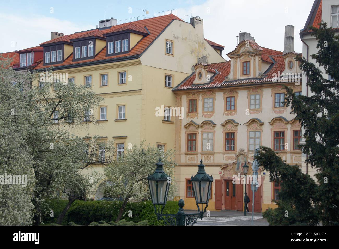 Prague buildings. Baroque facade with arched windows and decorative ...