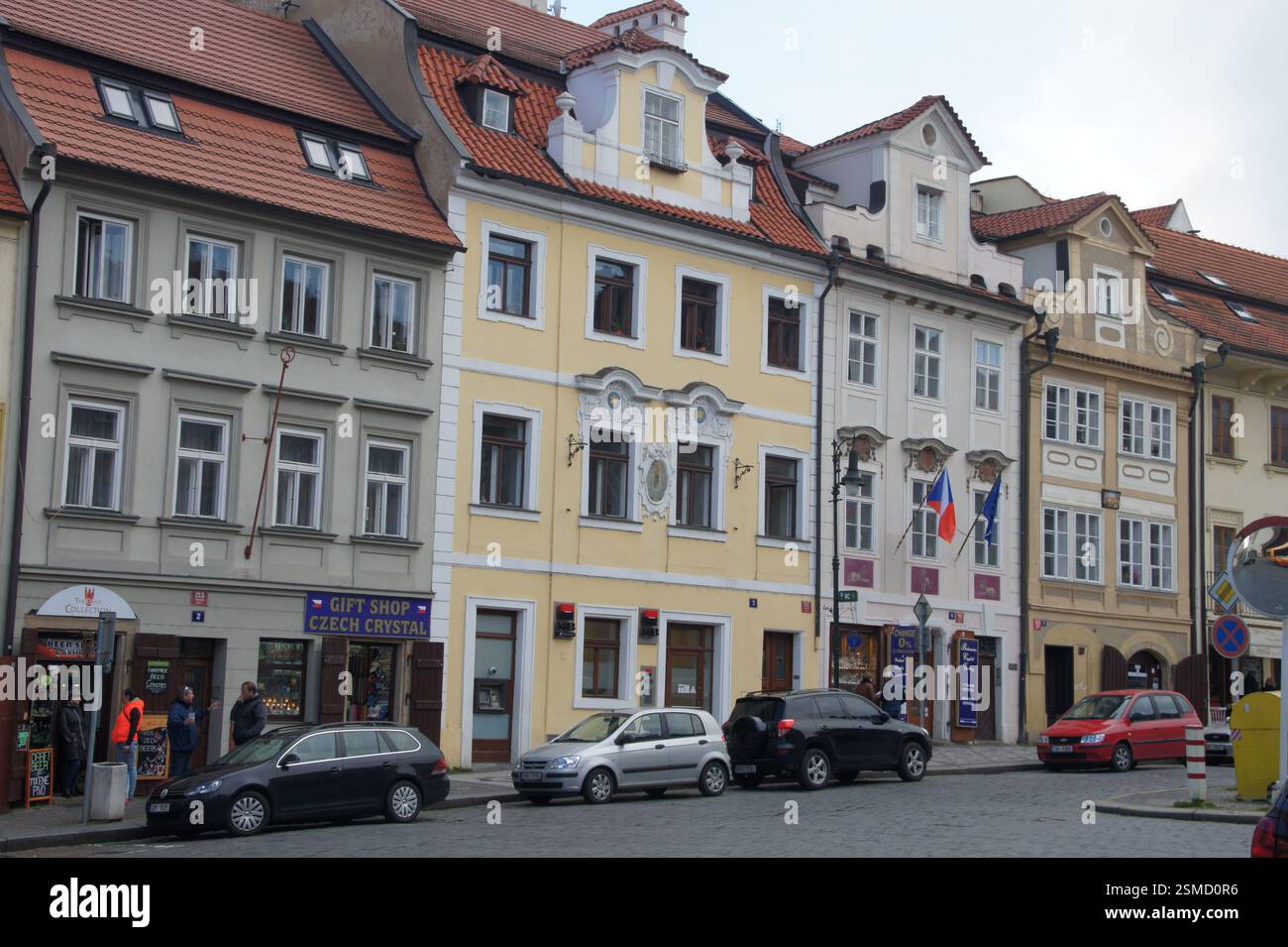 Street scene in Prague, Czech Republic. Colorful buildings with ornate ...