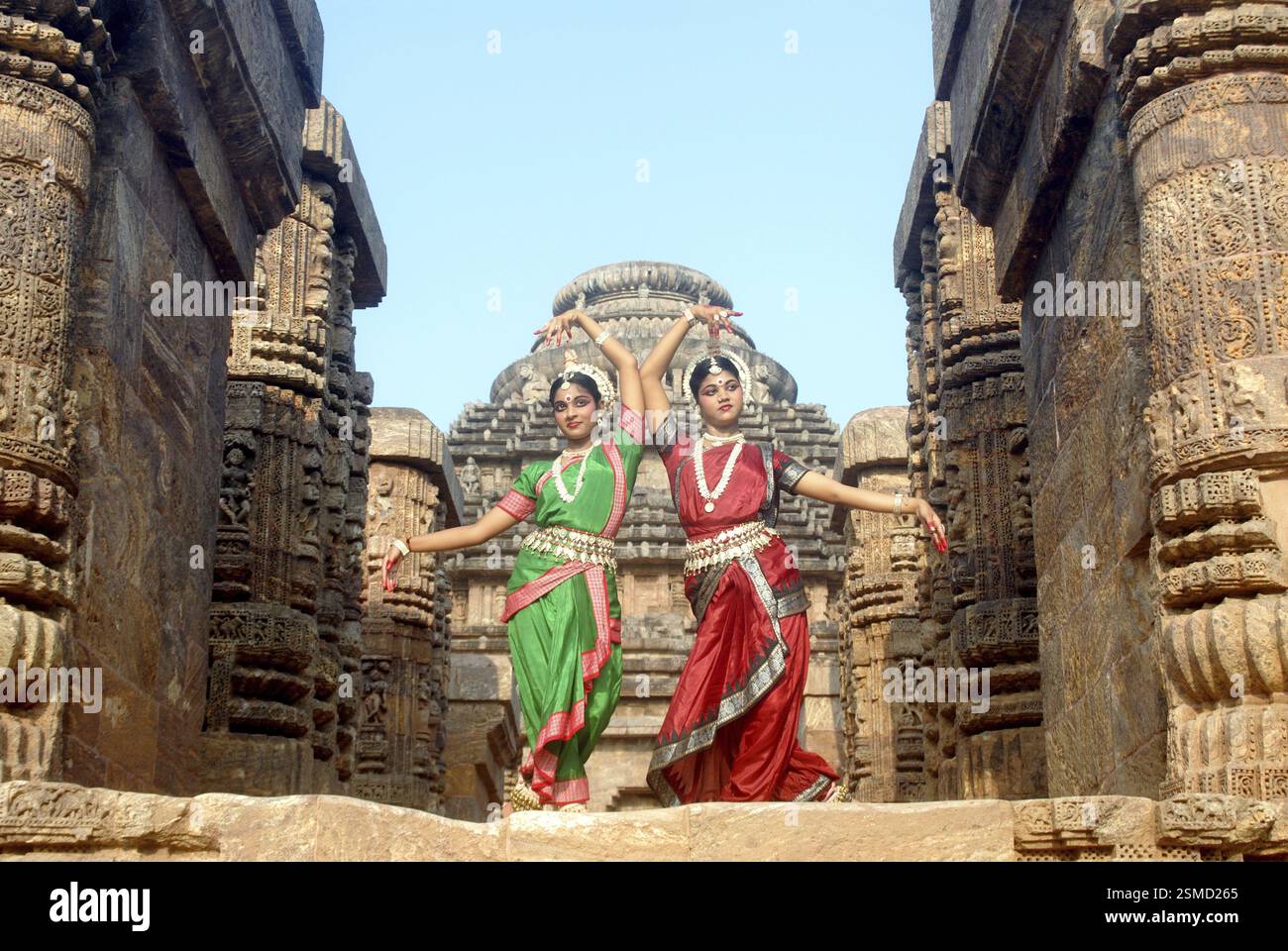 Dancers performing classical traditional odissi dance in front of ...