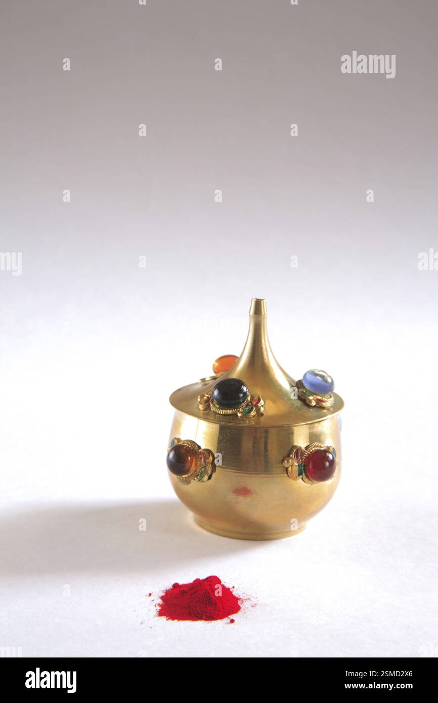 Concept, still life sindoor or kumkum vermillion powder with pot on ...
