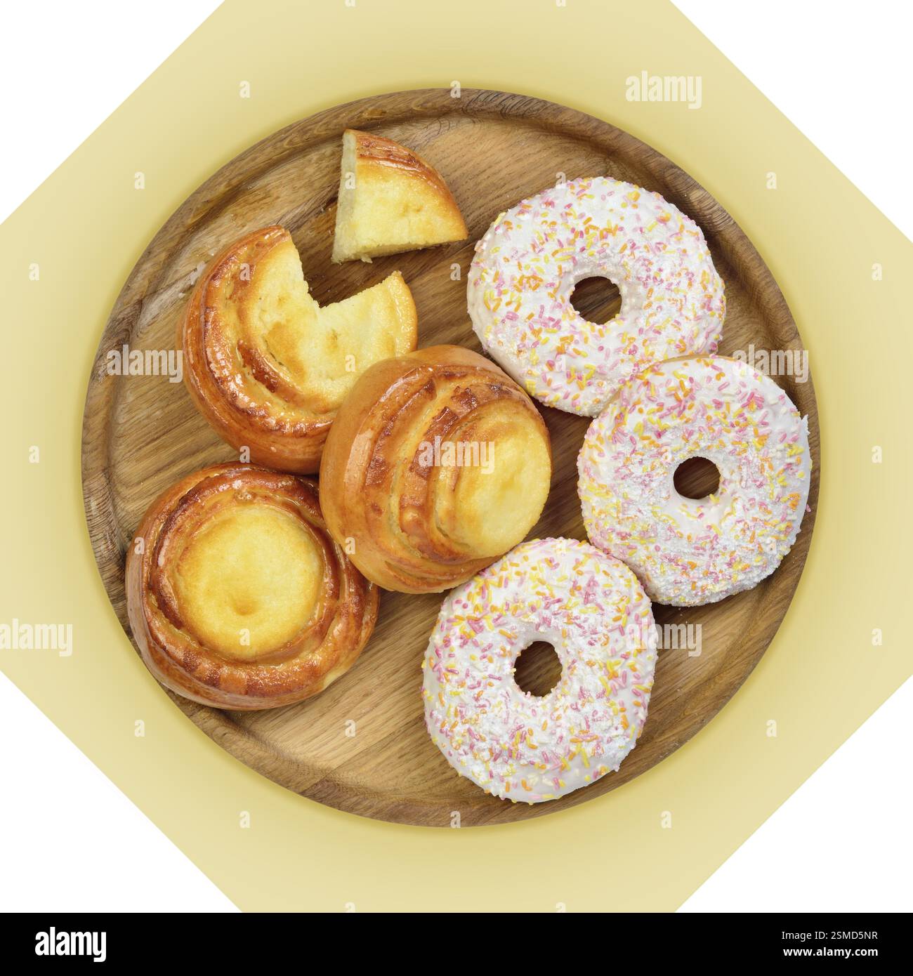 Wooden dish of cheese pies and donuts. Isolated image with white ...