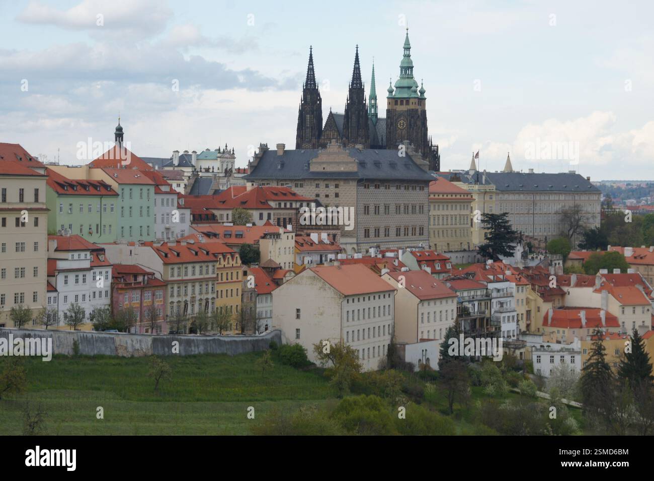 Prague Castle, a sprawling complex of buildings atop a hill overlooking ...