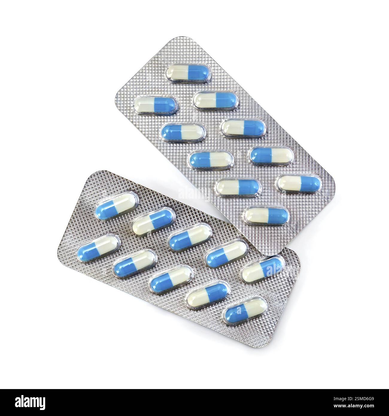 Blue capsules in two packs isolated on white background Stock Photo - Alamy