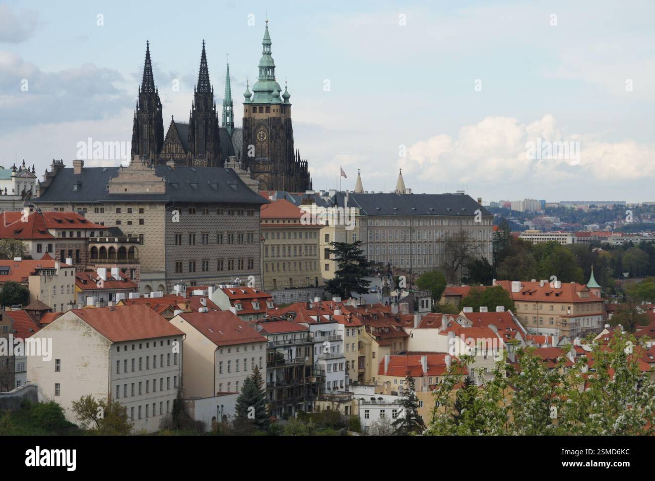 Prague Castle, a sprawling complex of buildings atop a hill overlooking ...