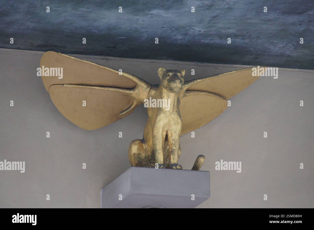 Golden winged lion sculpture. Majestic appearance with outstretched ...