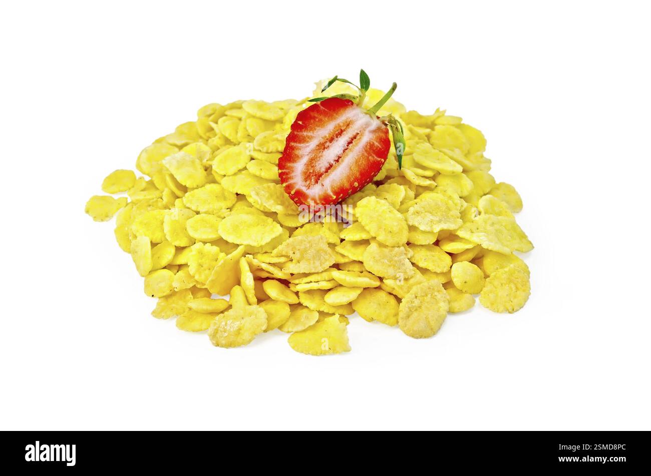 A pile of corn flakes with strawberries cut in half isolated on white ...