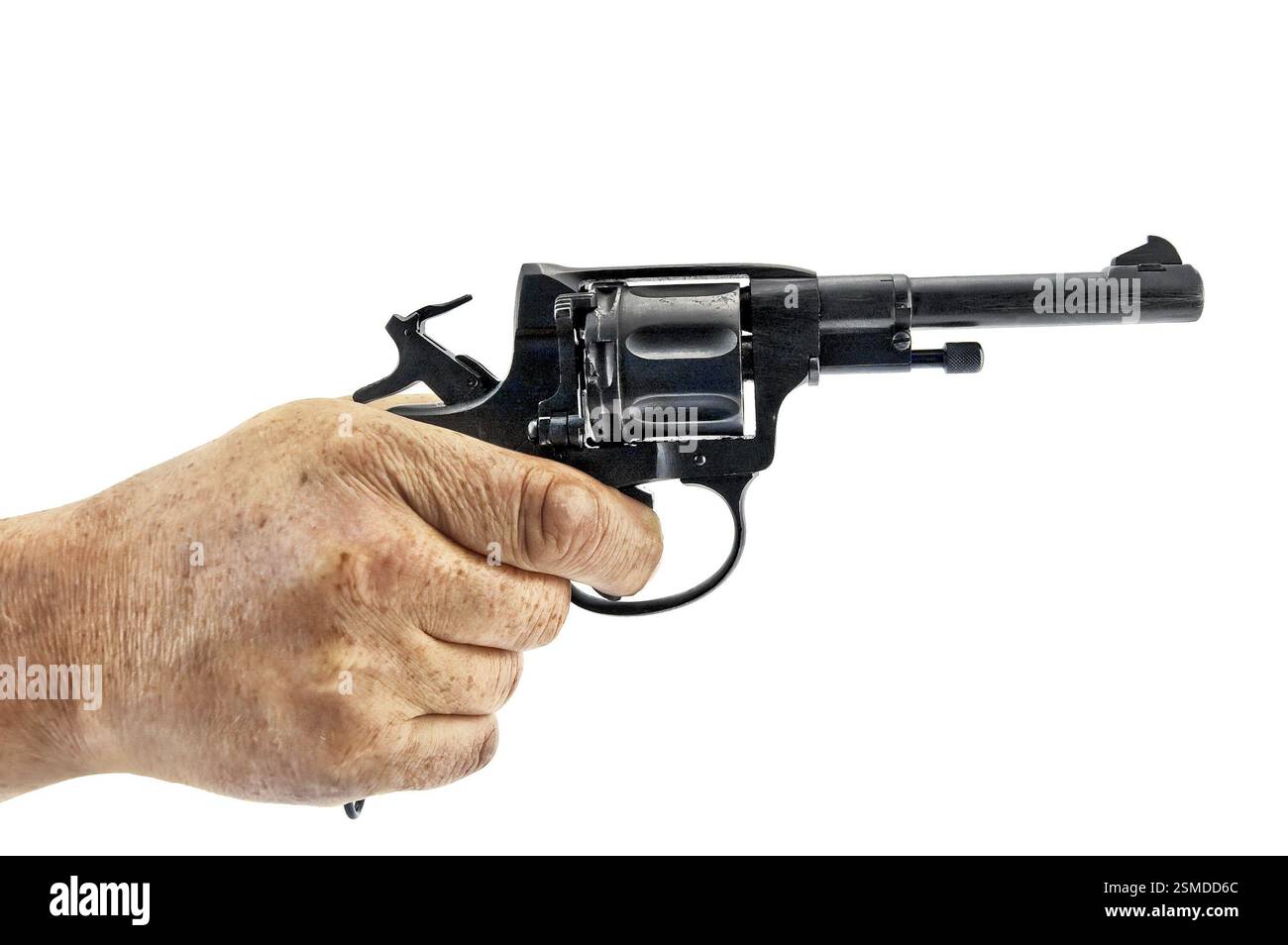 Black revolver in the man's hand isolated on white background Stock ...