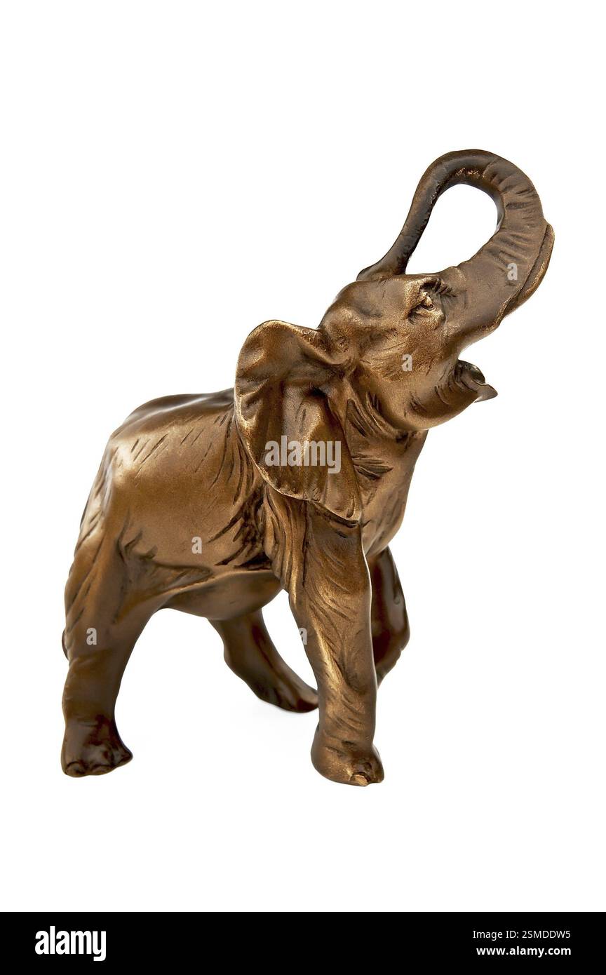 Metal elephant figurine isolated on white background Stock Photo - Alamy