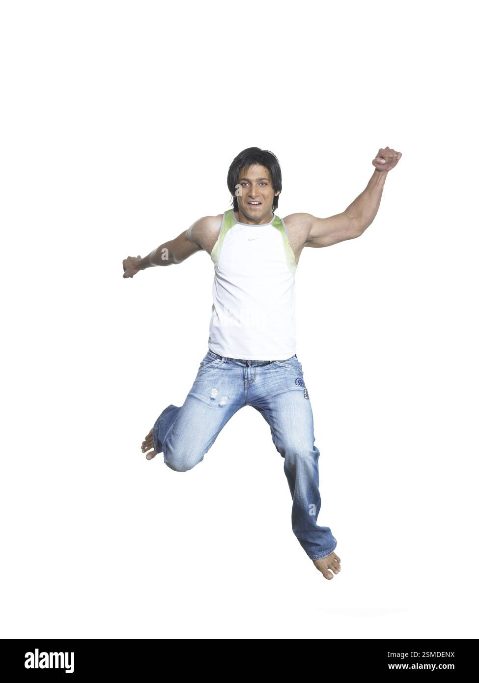 South Asian Indian man jumping with joy MR Stock Photo - Alamy
