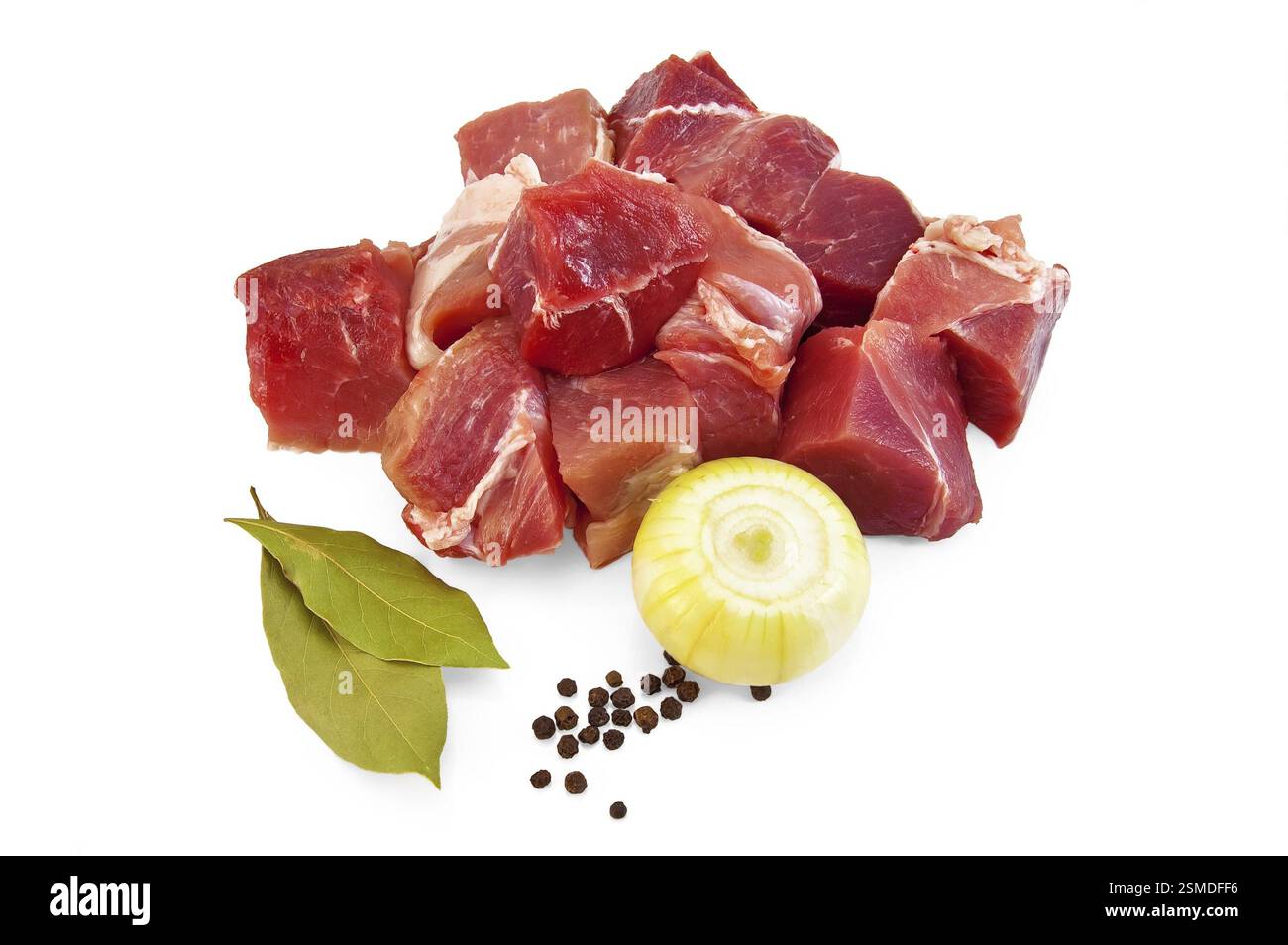 Chunks of pork, two laurel leaf, black pepper, peas, onion, isolated on ...