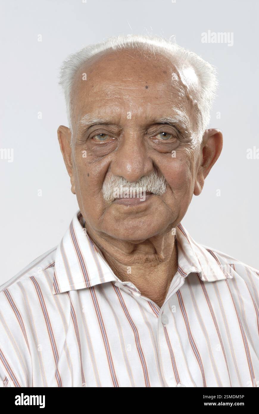 South Asian Indian grandfather looking at camera MR#152 Stock Photo - Alamy