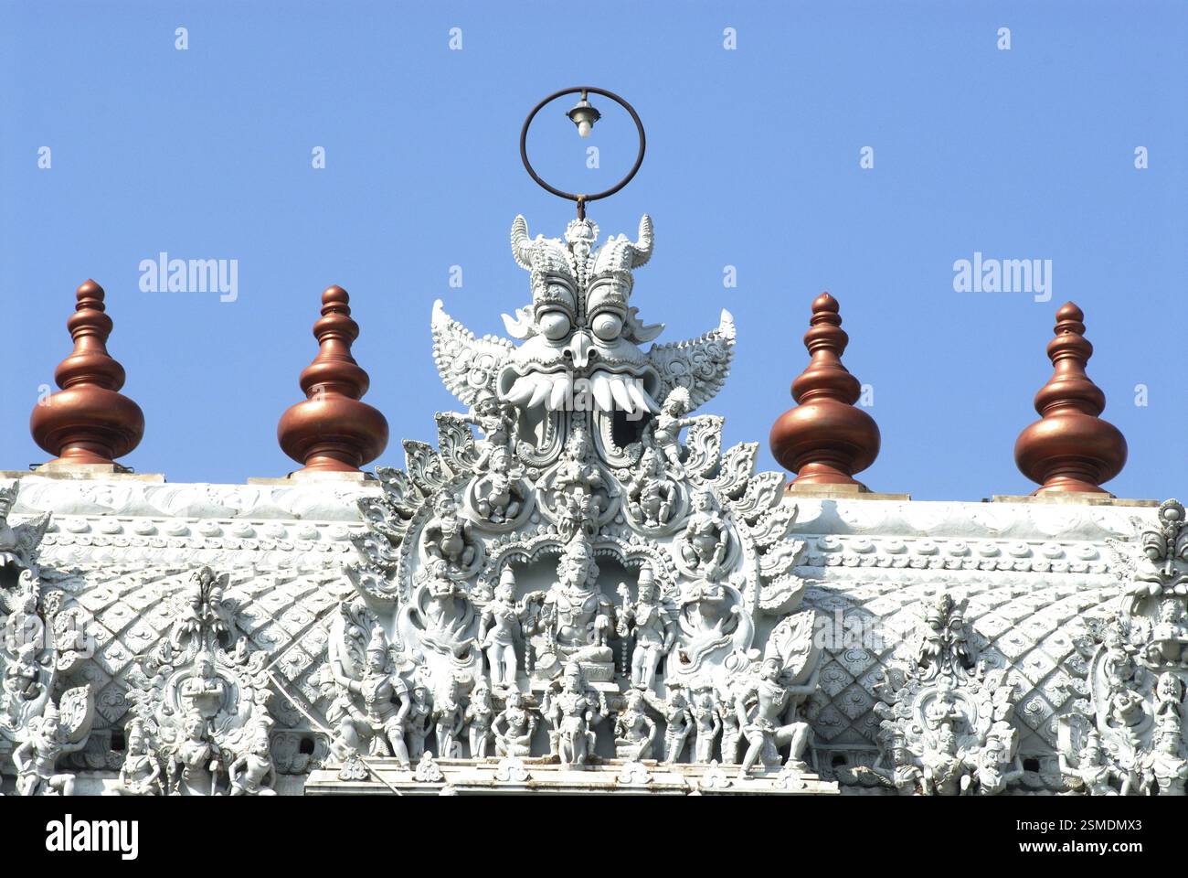Gopuram of temple covered with statues richly decorated facade of ...