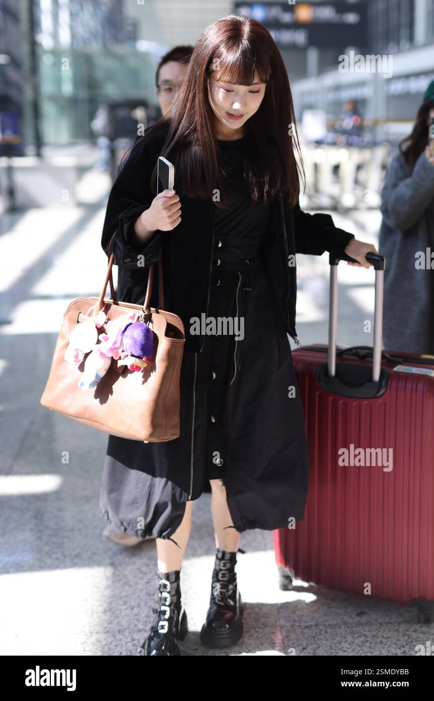 Chinese idol singer and actress Li Yitong appears at the airport in ...