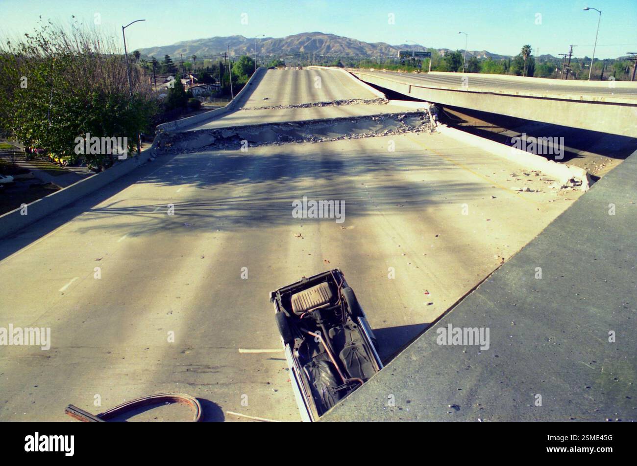 Los Angeles, CA, USA, January 1994. Vehicle overturned after the ...