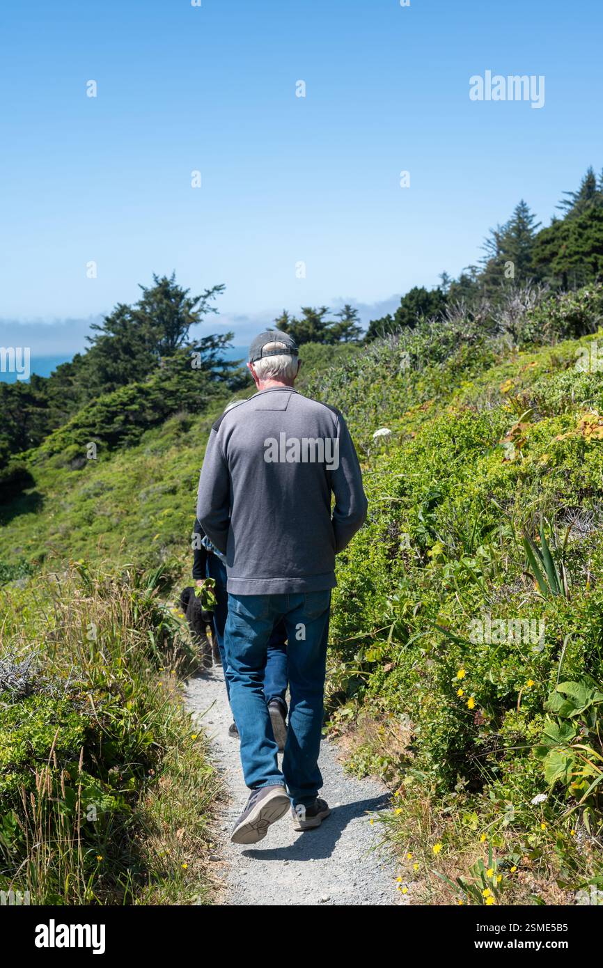 Tourist hiking on a trail at Port Orford Heads in Southern Oregon Stock ...
