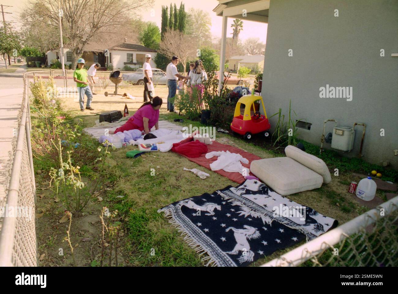 Los Angeles, CA, USA, January 1994. People outside their homes after ...