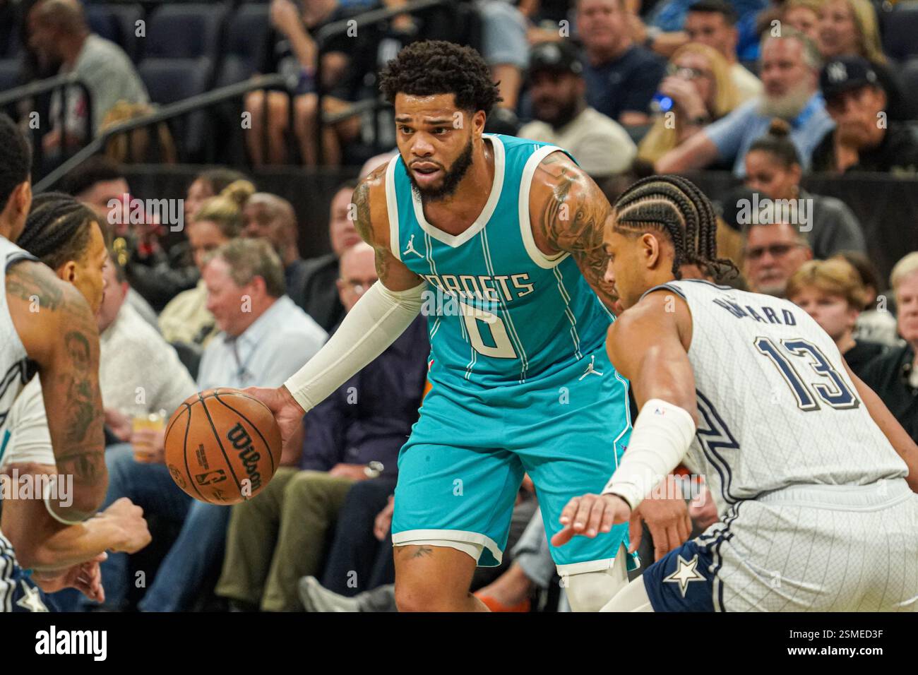 Orlando, Florida, USA, February 12, 2025, Charlotte Hornets forward Miles Bridges #0 rushes ...