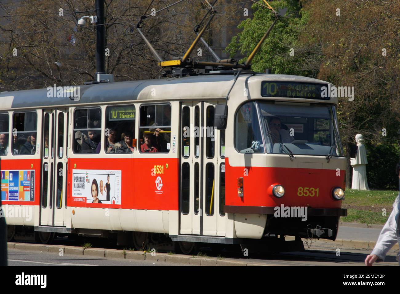 Tram Tatra T3R.P. Red and white tram with green stripes. Public ...
