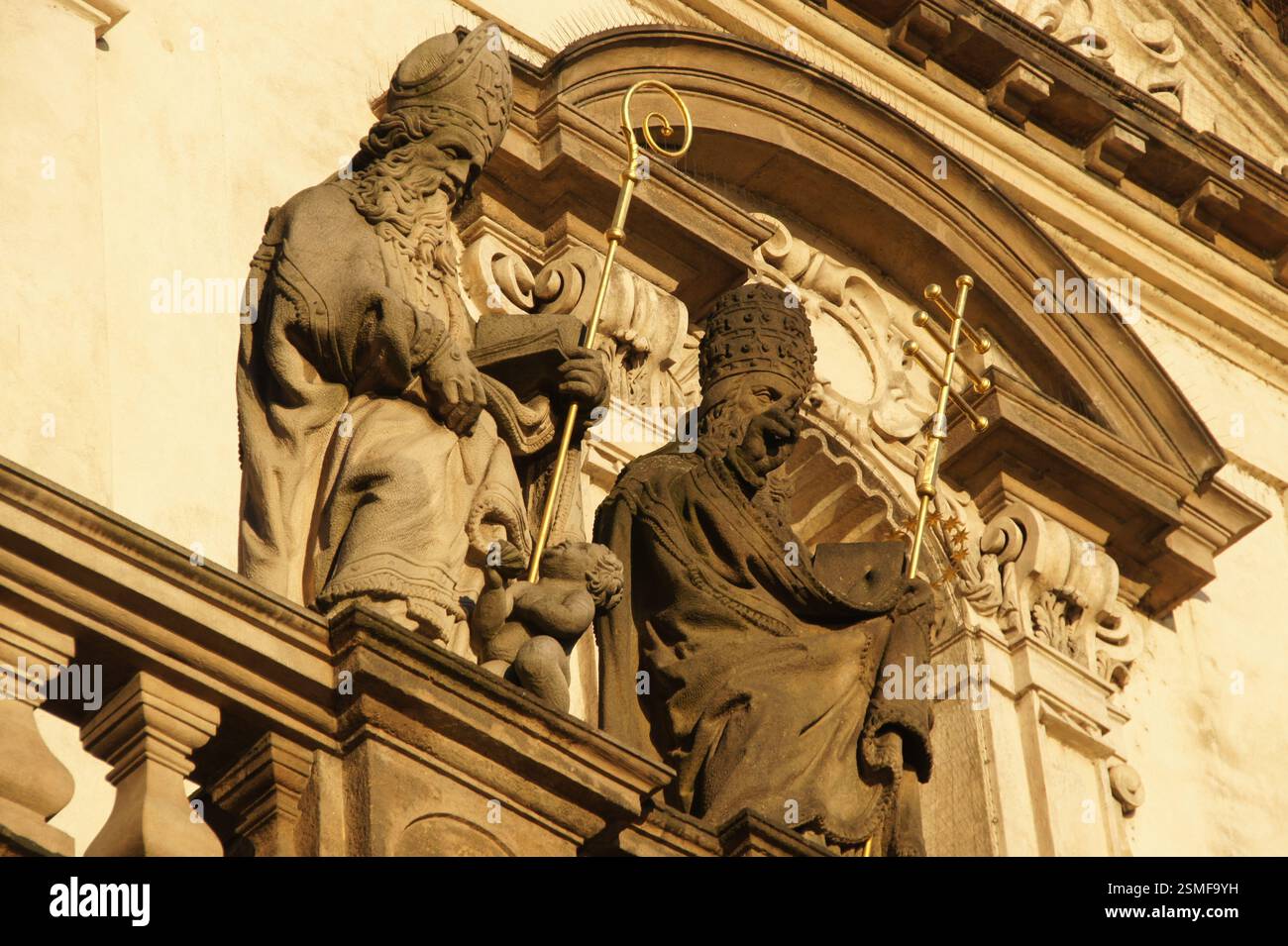 Architectural sculpture of two bishops, Czech Republic. Baroque style ...