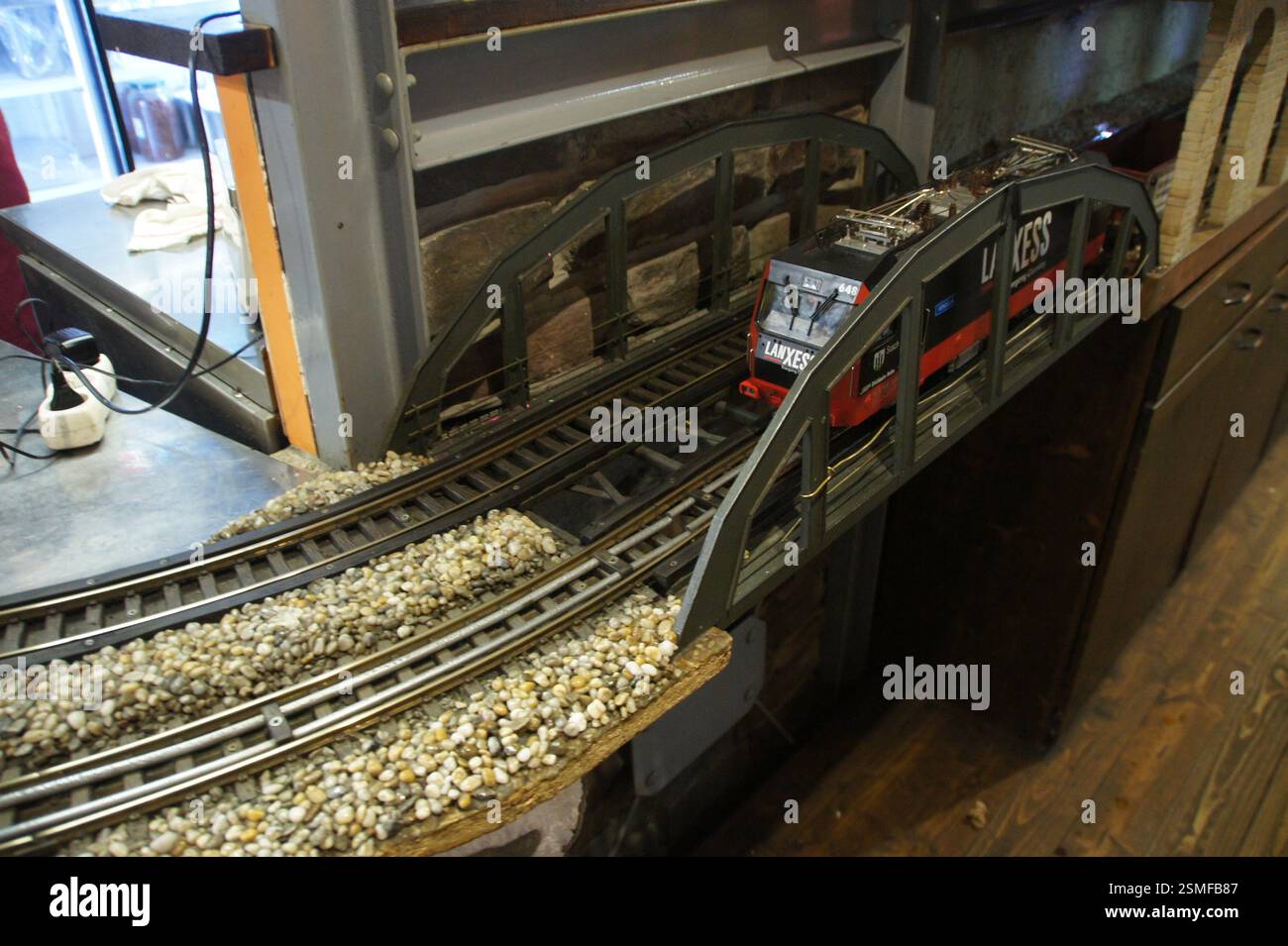 Czech Republic: Model train layout with bridge and locomotive. Detailed ...