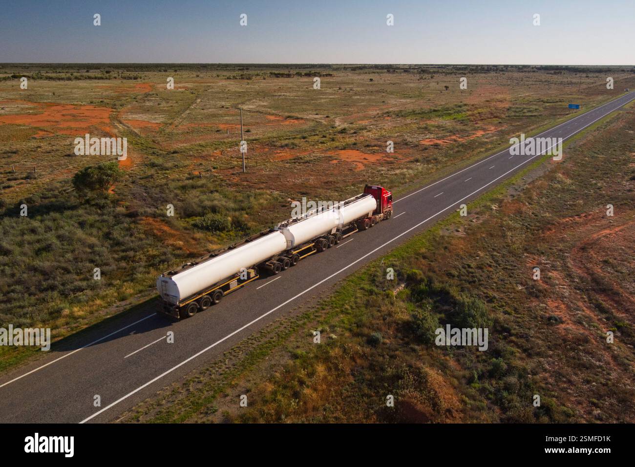 Aerial of a B Triple liquid fuel tanker on the Barrier Highway halfway ...