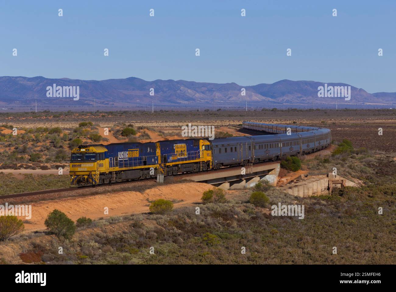 The Ghan luxury passenger travel train passing in front of the Finders ...