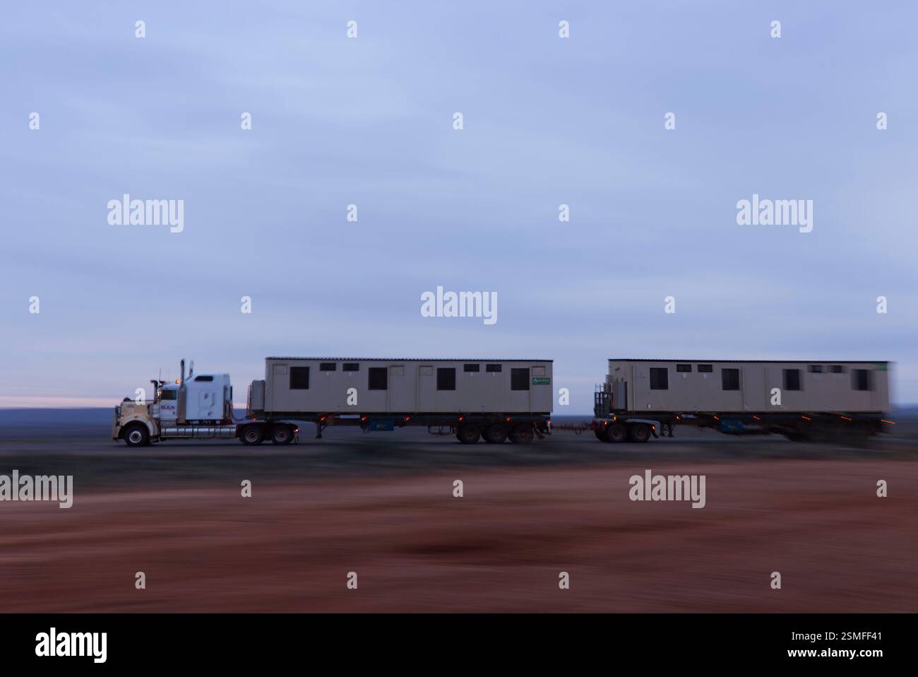 Portable Building - Donga being tranported by Roadtrain travelling the ...