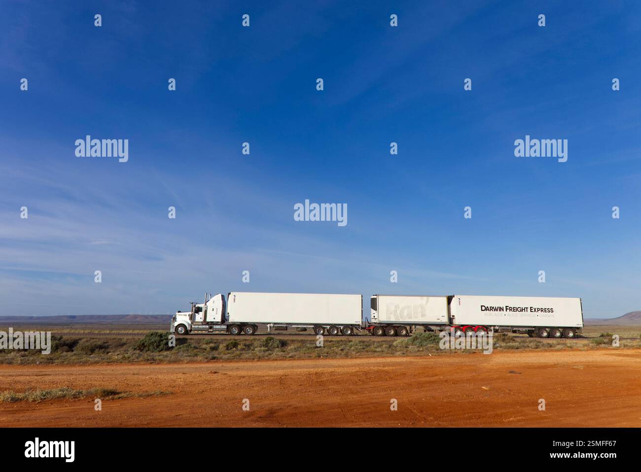 Side view of Darwin Express Road Train travelling the Stuart highway in ...