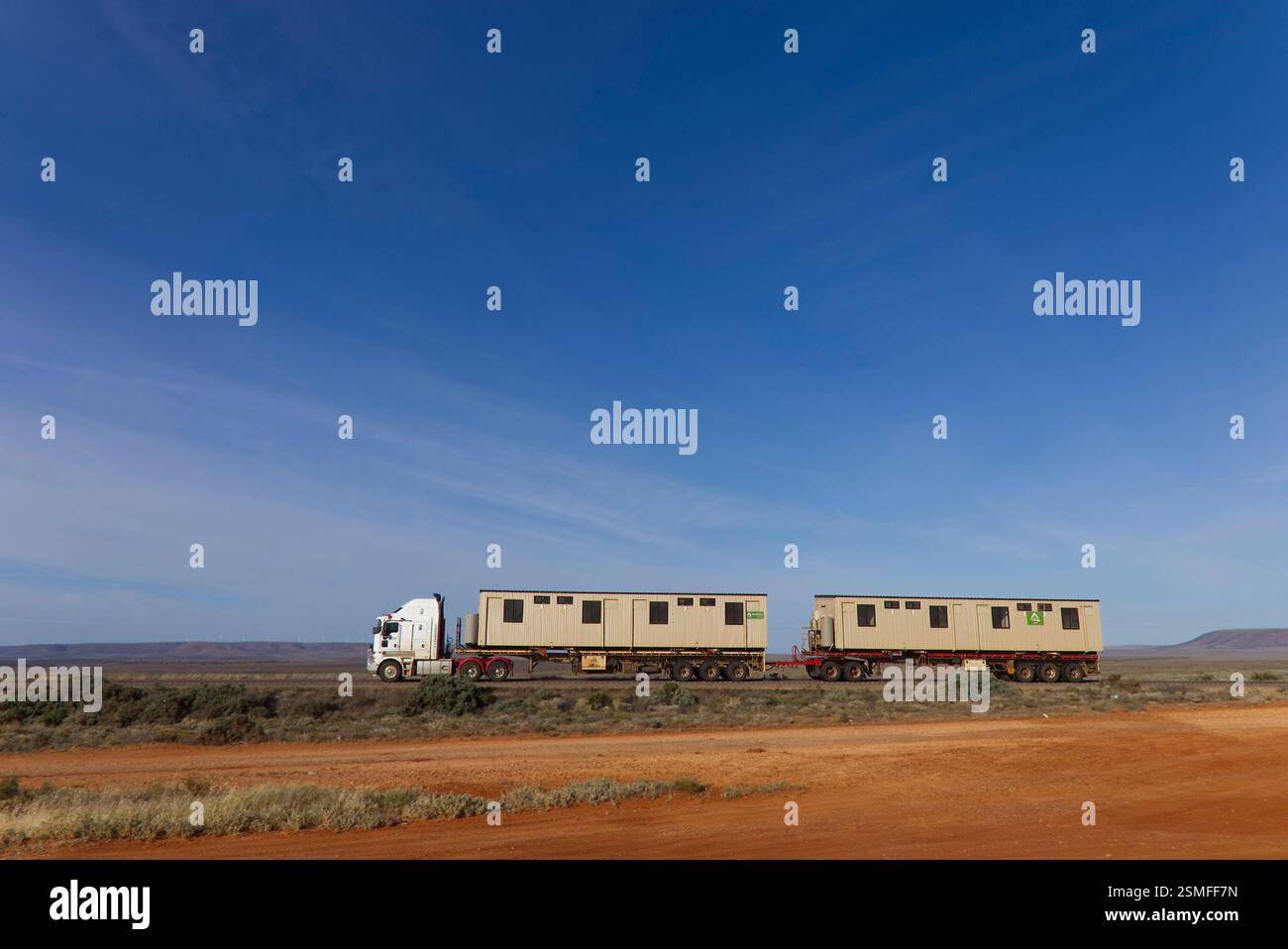Portable Building - Donga being tranported by Roadtrain travelling the ...