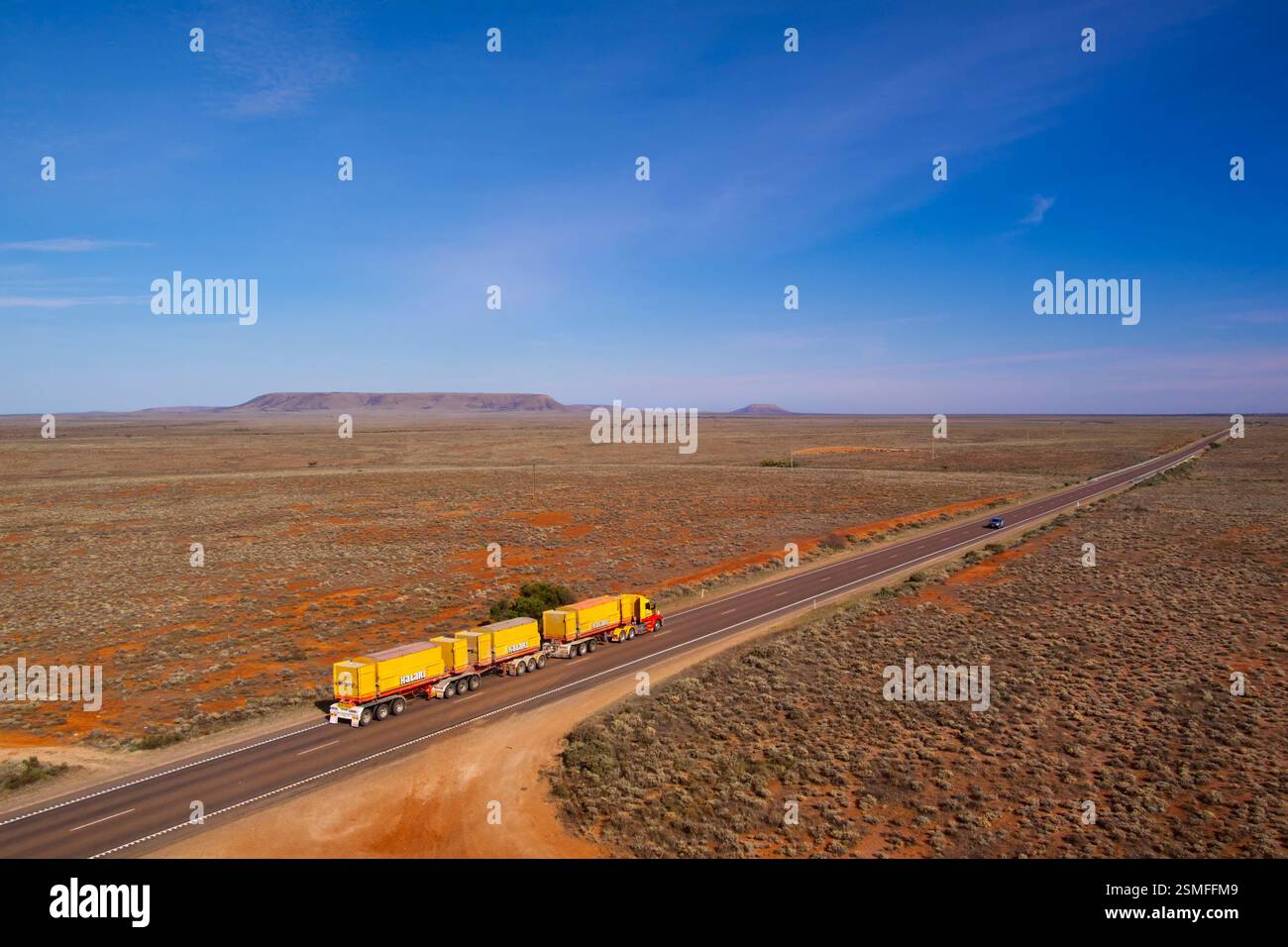 Aerial of heavy haulage Road Train on the Stuart Highway South ...