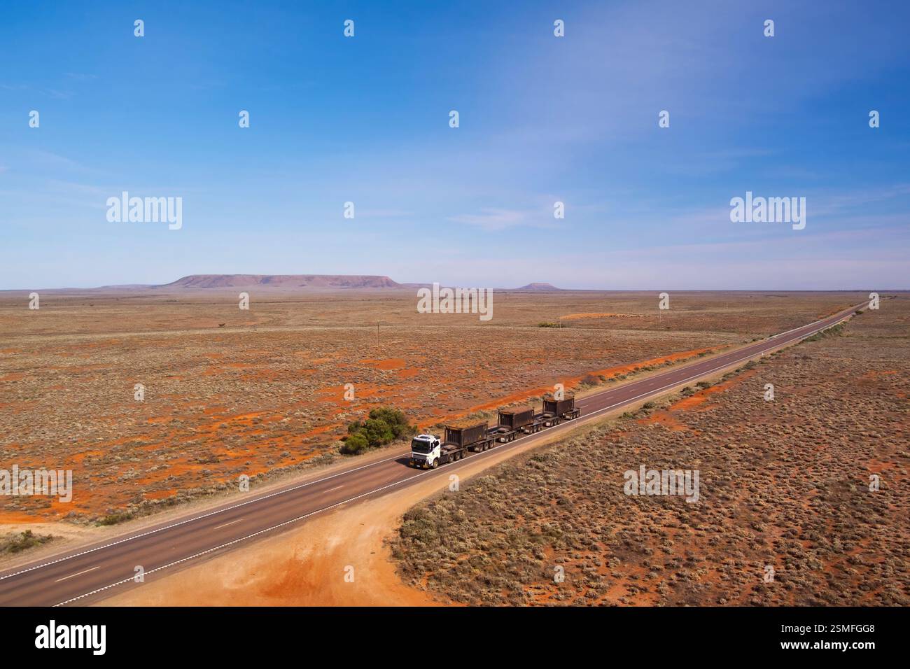 Aerial of heavy haulage Road Trains on the Stuart Highway South ...