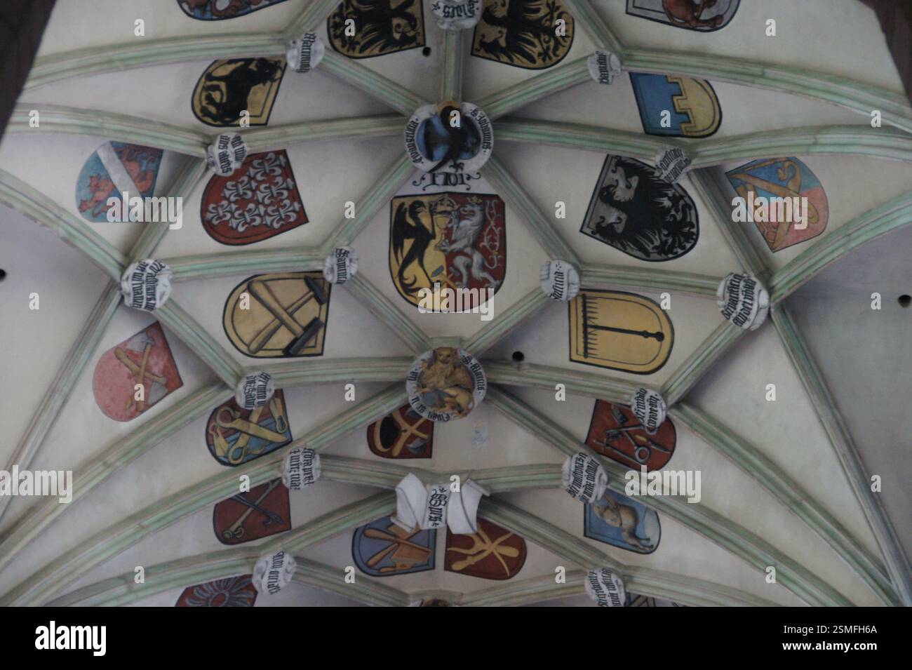 Gothic ceiling with intricate coat of arms. A masterpiece of medieval ...