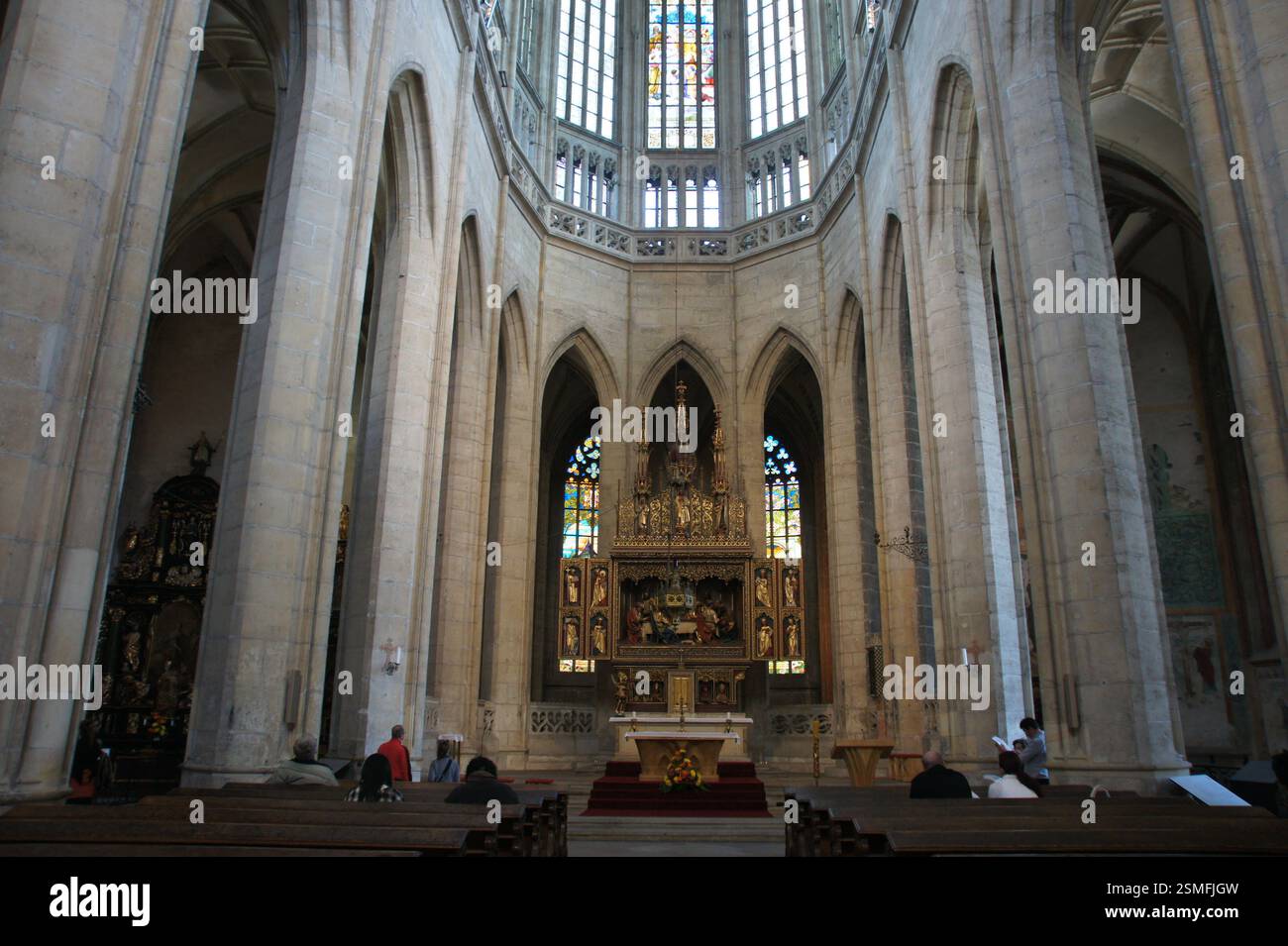 St Barbara's Cathedral, Kutná Hora. Interior with tall columns, arched ...