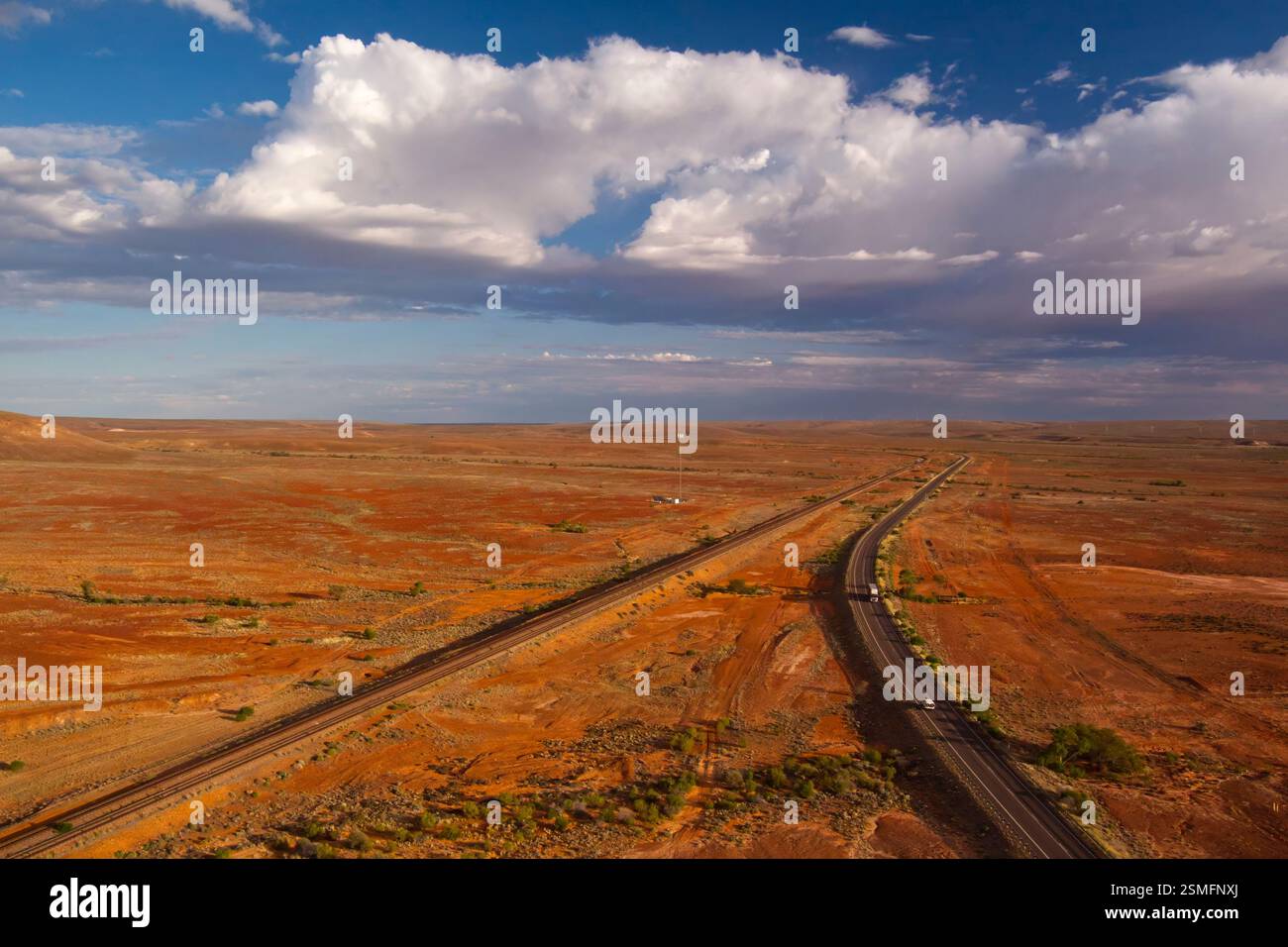 The image captures a vast and open landscape of the Stuart Highway in ...